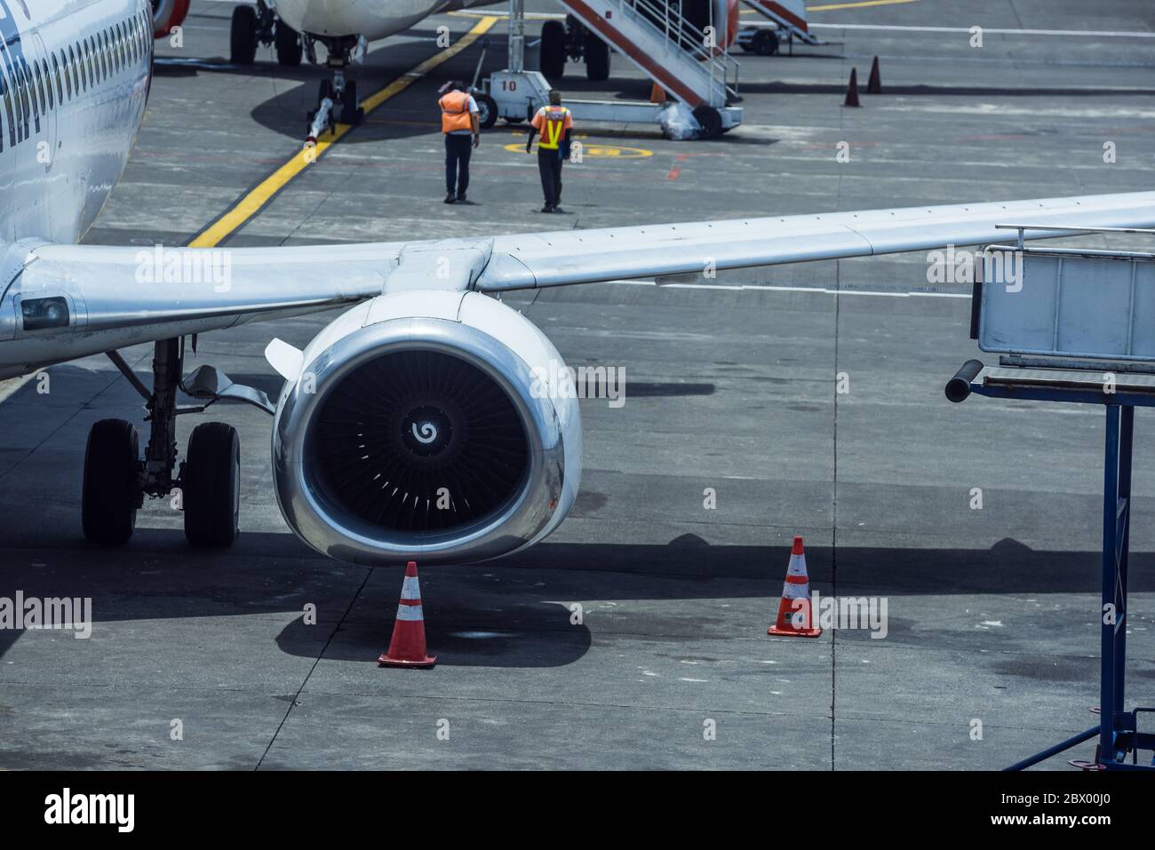 airplane at parking apron view from window of waiting hall of air ...