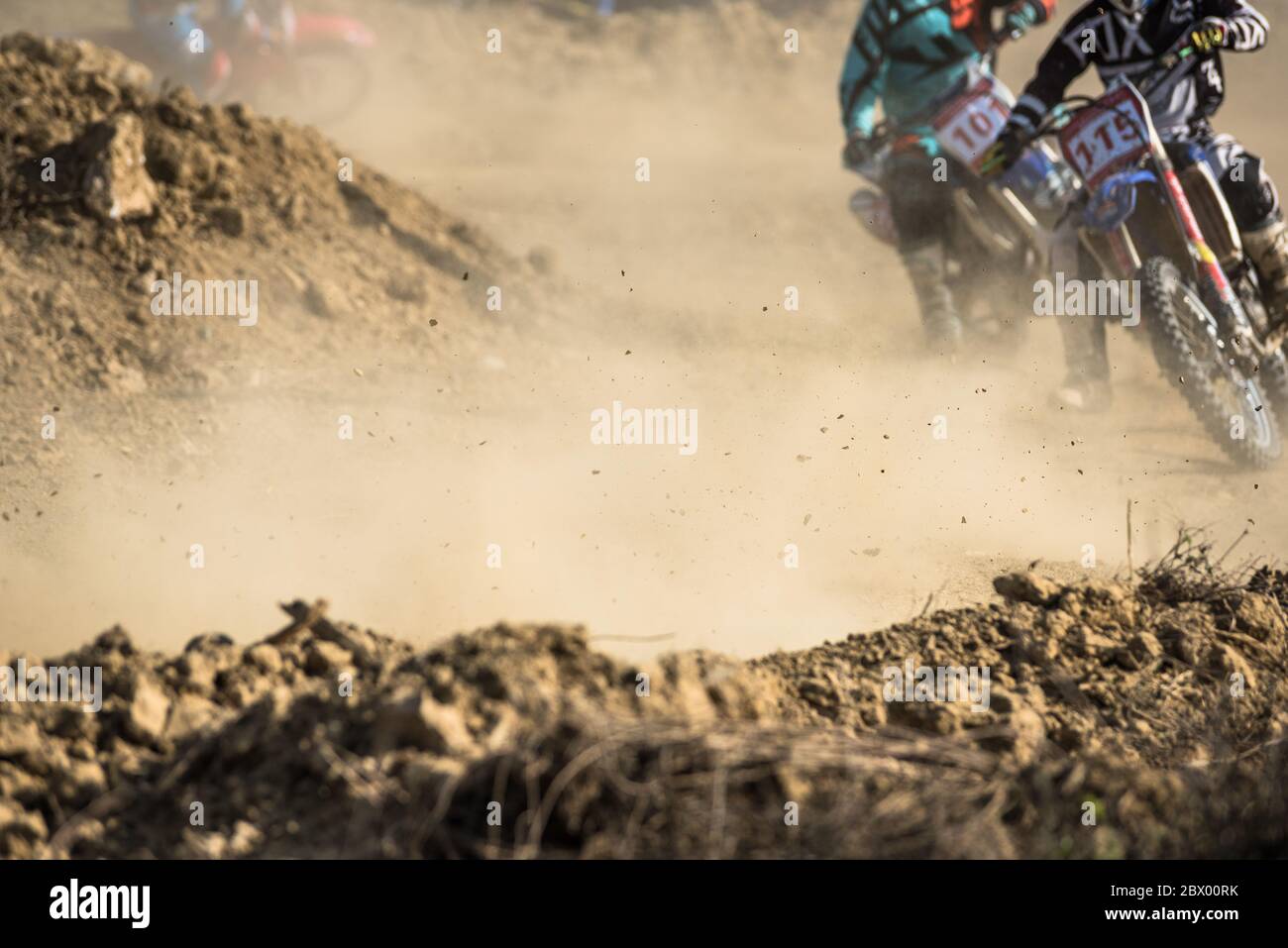 dirt fly after motocross roaring by Stock Photo - Alamy