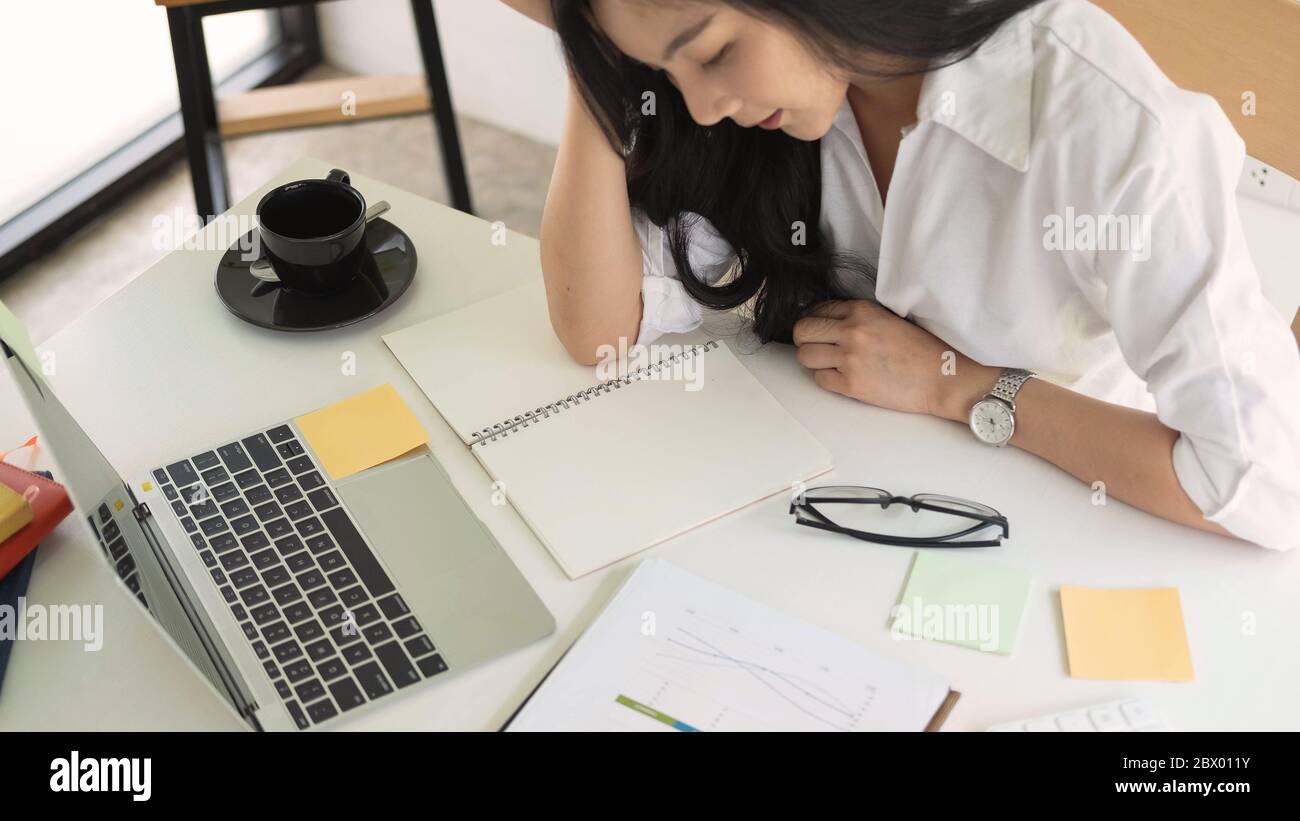 Business woman working finance on wooden desk in office and business ...