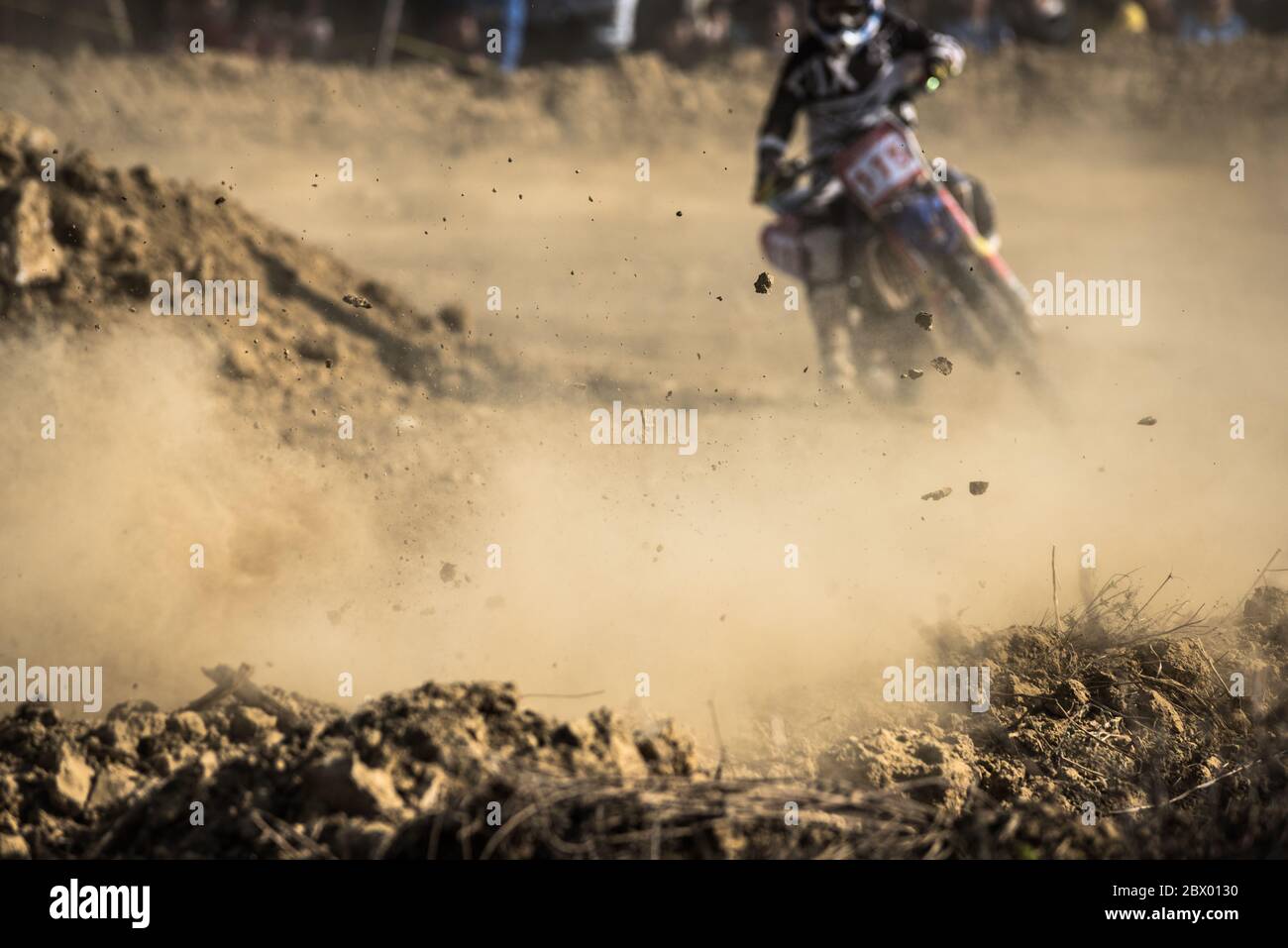 dirt fly after motocross roaring by Stock Photo - Alamy
