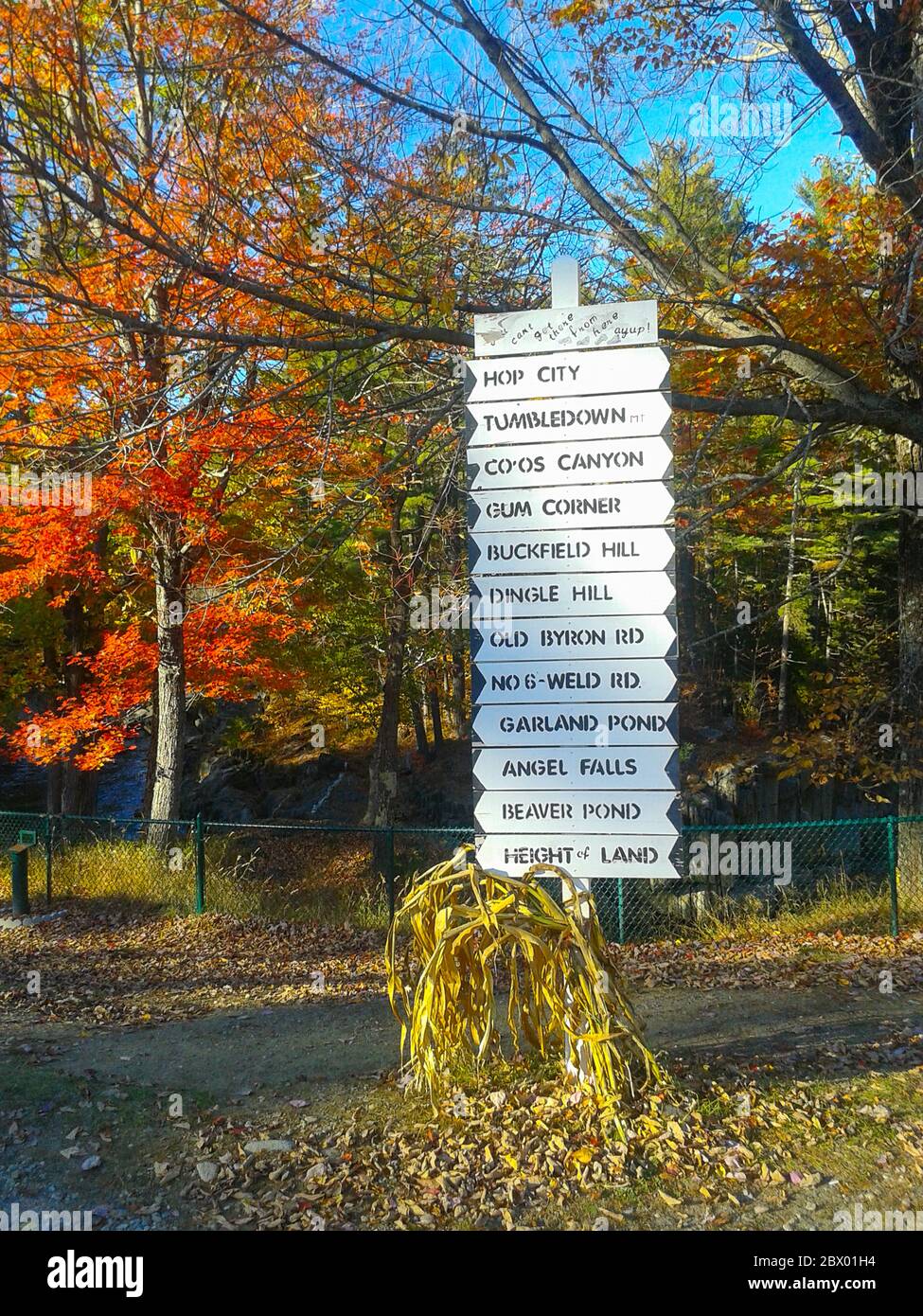 This sign points to a variety of scenic places, and it leads people to ...