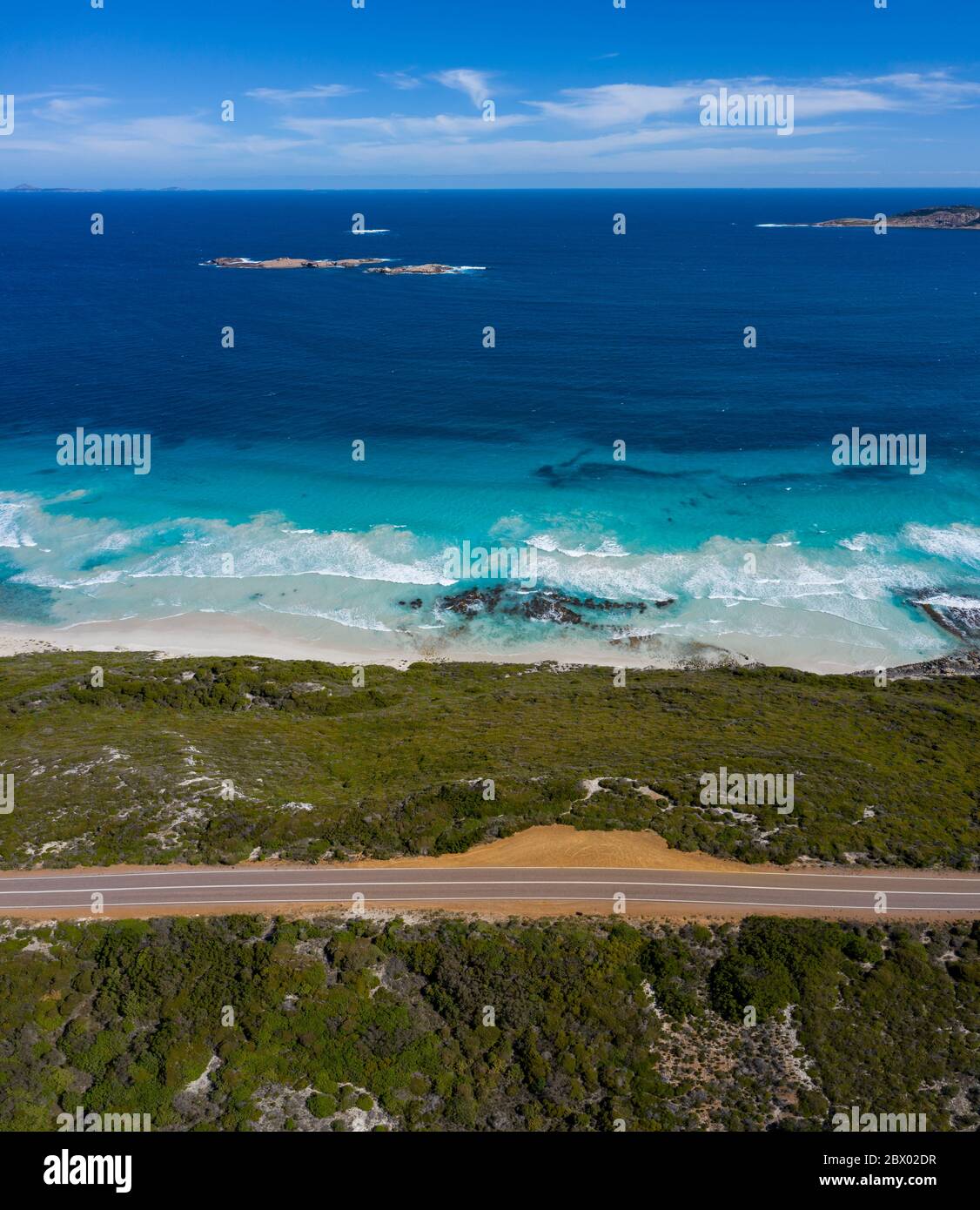Aerial view of the empty road beside the ocean at Ten Mile Lagoon in ...