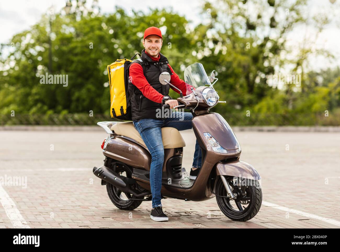 Delivering food scooter hi-res stock photography and images - Alamy