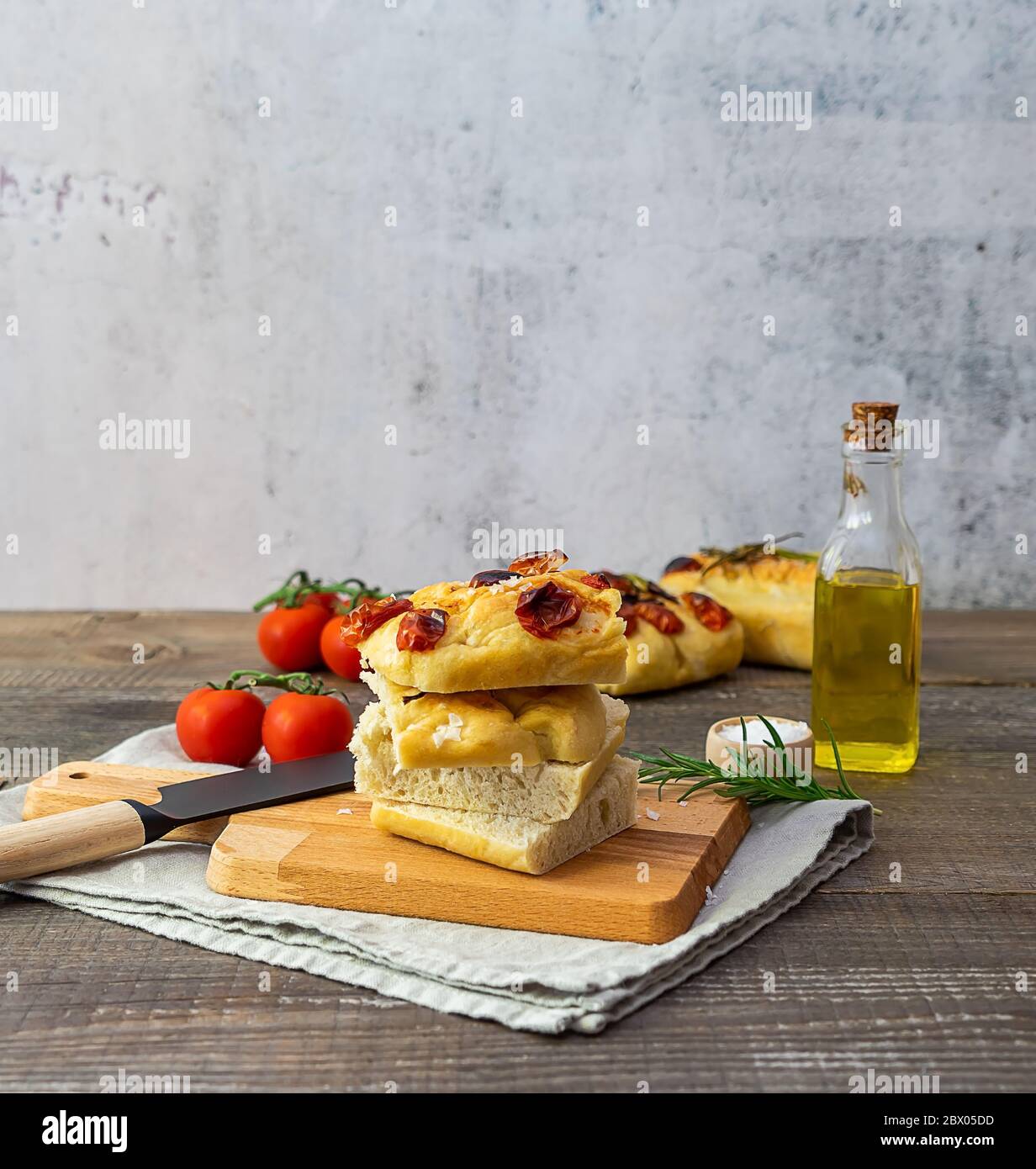 Vertical orientation of cut pieces focaccia with some ingredients Stock ...