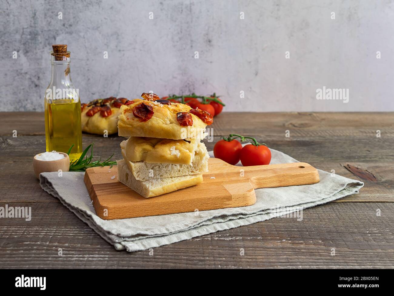 Cut pieces of focaccia with some ingredients Stock Photo - Alamy