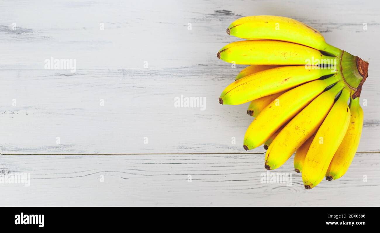 Bananas on gray wooden hi-res stock photography and images - Alamy
