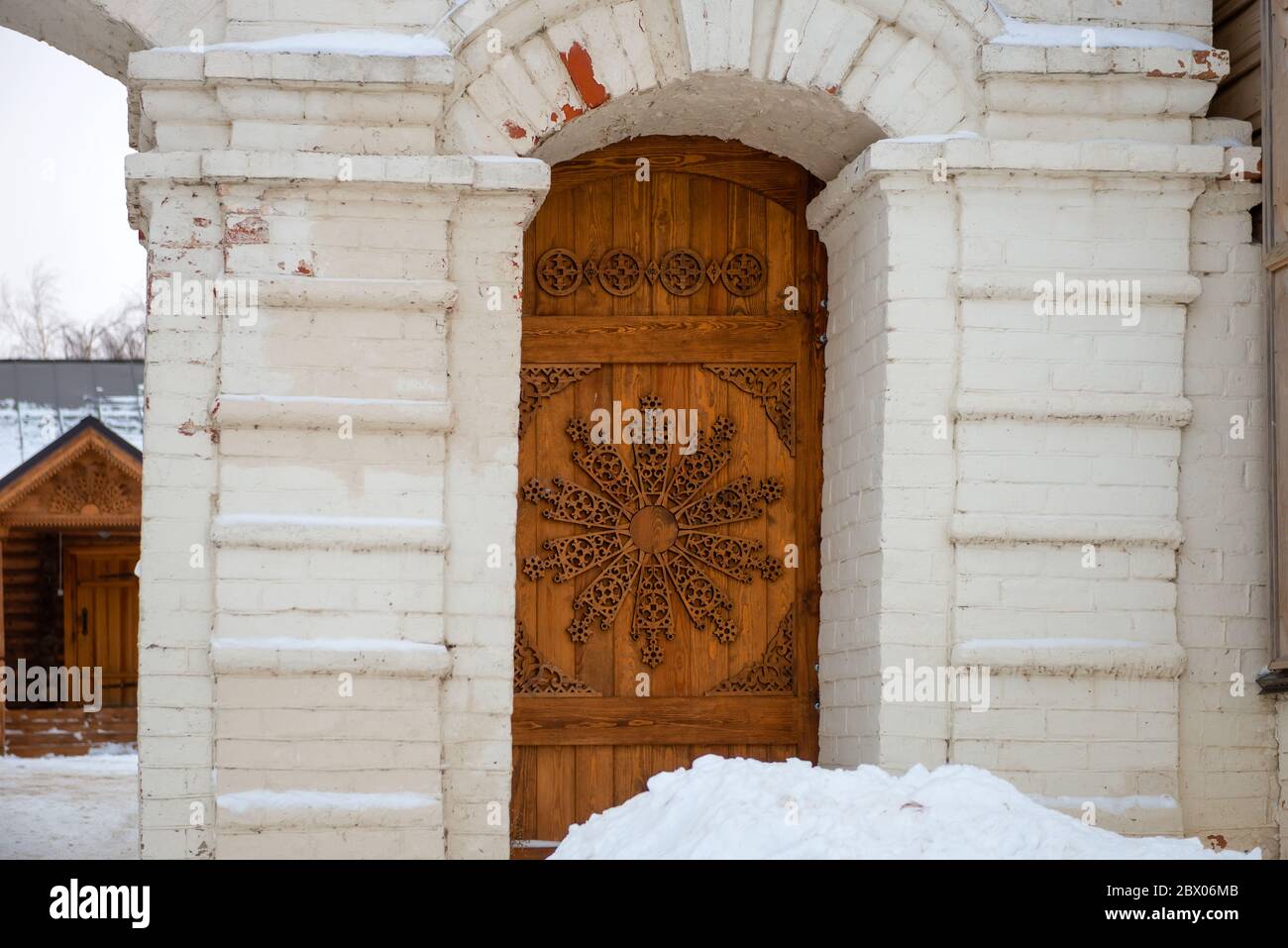 The Yellow gate of rural house with wooden carving in Russian village ...