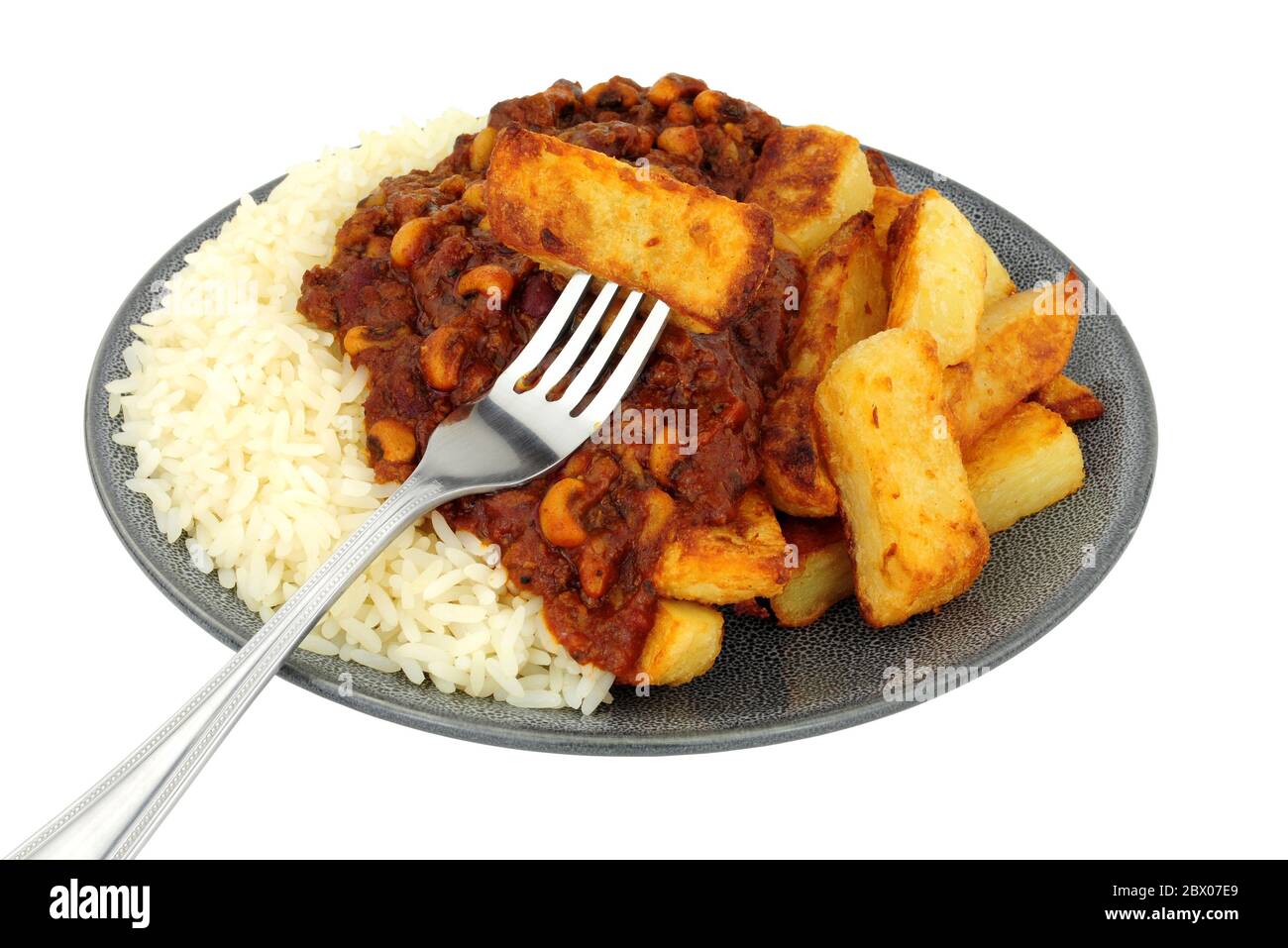 Chilli con carne meal with half chips and half rice isolated on a white ...