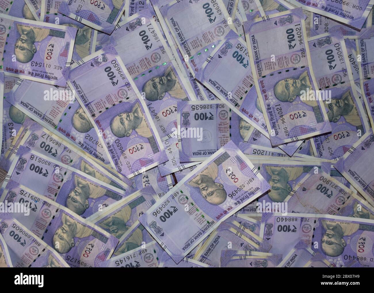 Group of New 100 Rs note background Stock Photo - Alamy