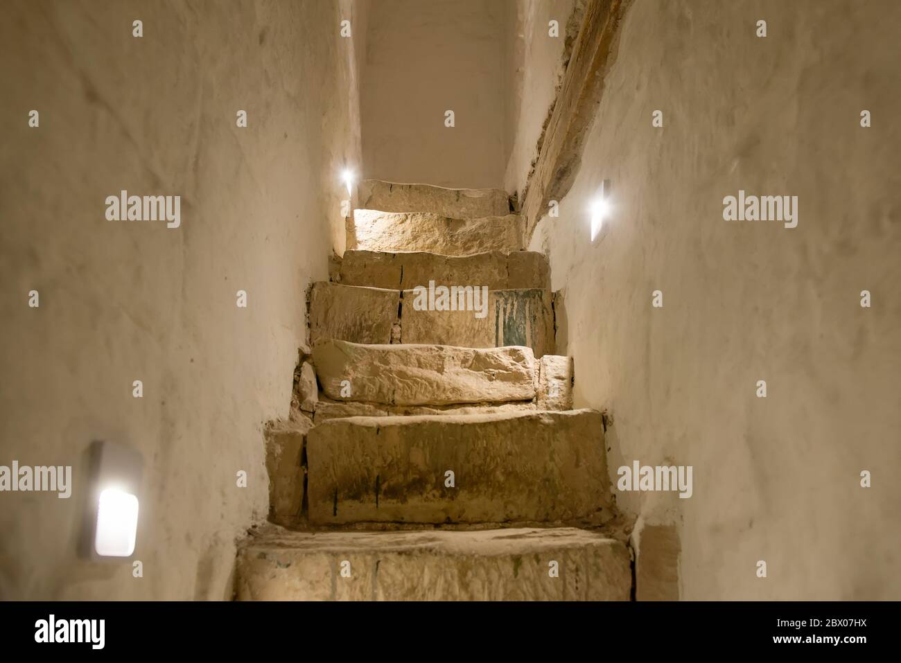 Stone steps of a ladder for climbing to the bell tower Stock Photo - Alamy