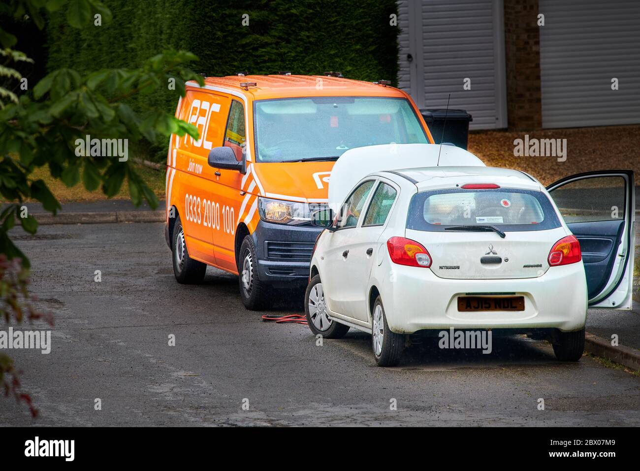 RAC roadside emergency rescue service attends a car which is broken ...