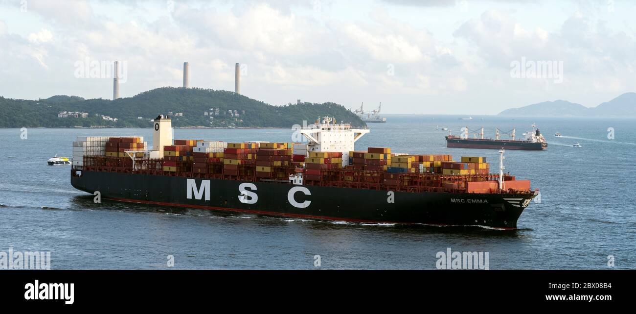 Container ships transporting cargo into Hong Kong from mainland China ...