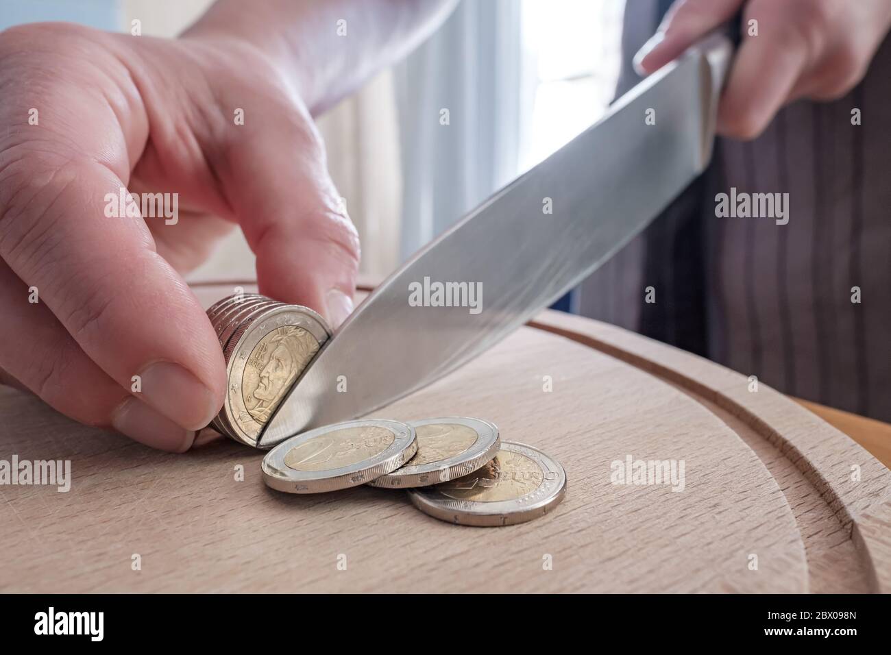 Euro coin on hands hi-res stock photography and images - Alamy