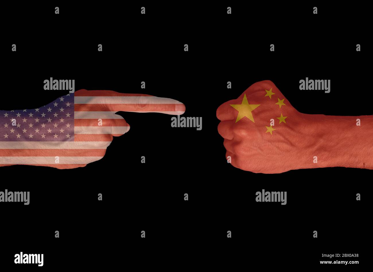 Two hands in discussion pose with USA and China flags overprinted on ...