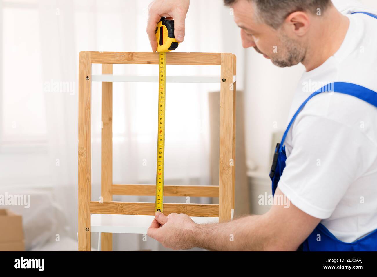 Professional Carpenter Measuring Shelf With Tape Working Indoor Stock ...