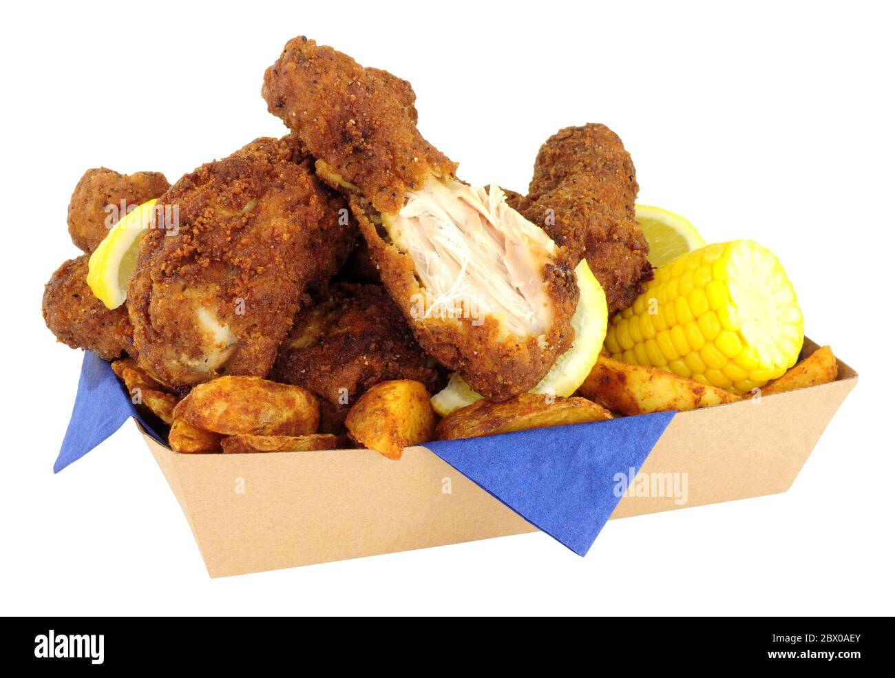 Southern fried chicken portions in a cardboard take away tray isolated ...