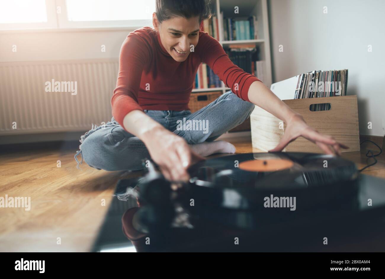 Woman playing record hi-res stock photography and images - Alamy