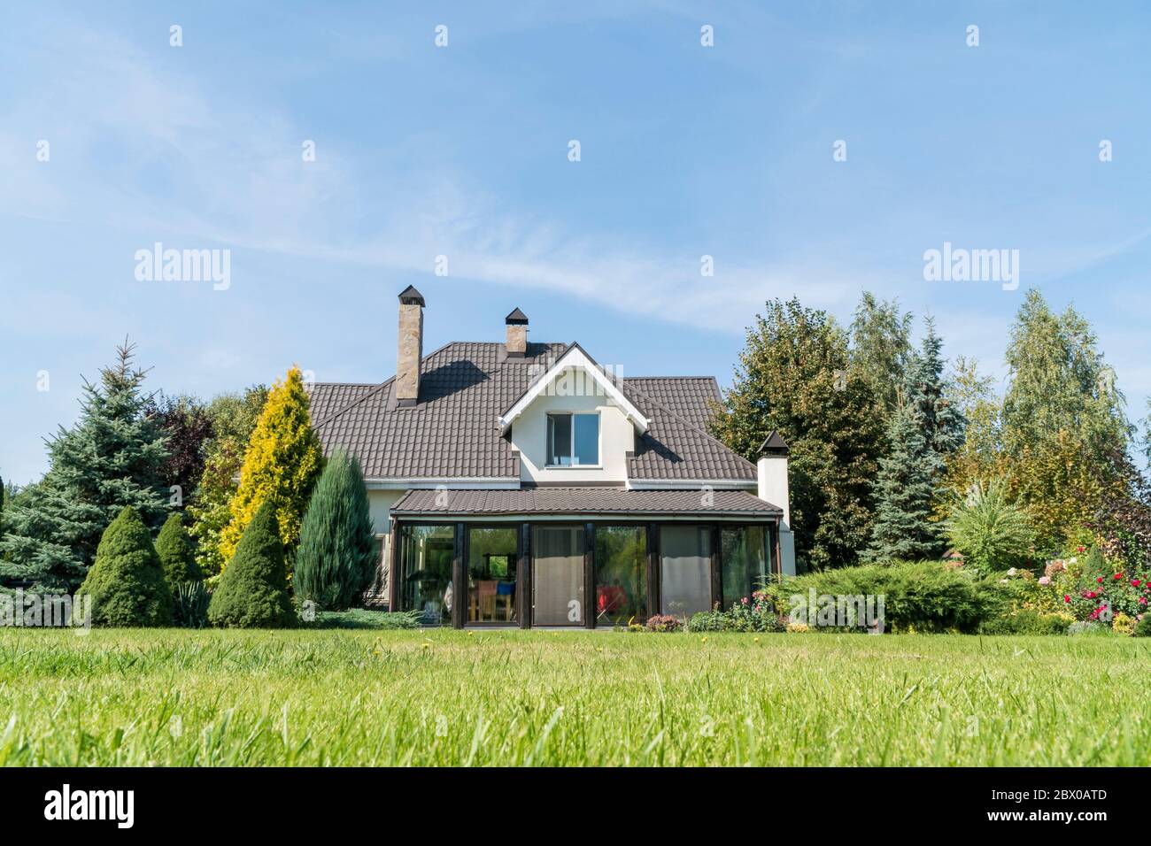 a beautiful village house with its beautiful garden in a rural area ...