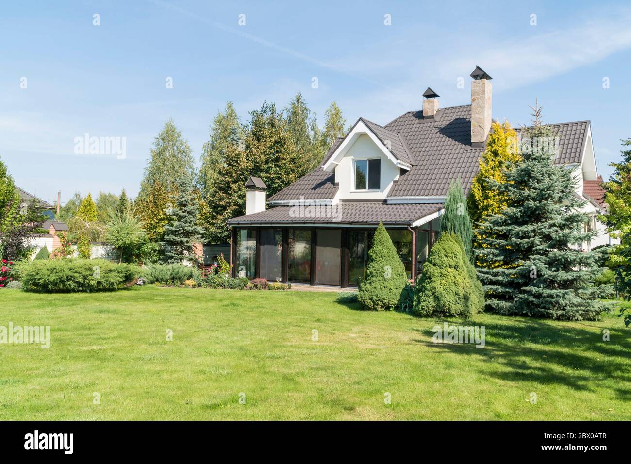 a beautiful village house with its beautiful garden in a rural area ...