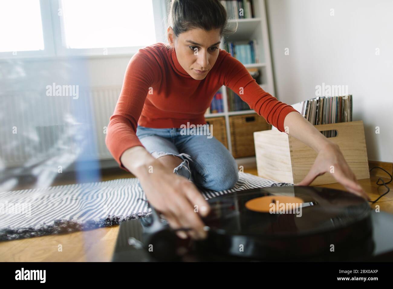 Woman playing record hi-res stock photography and images - Alamy