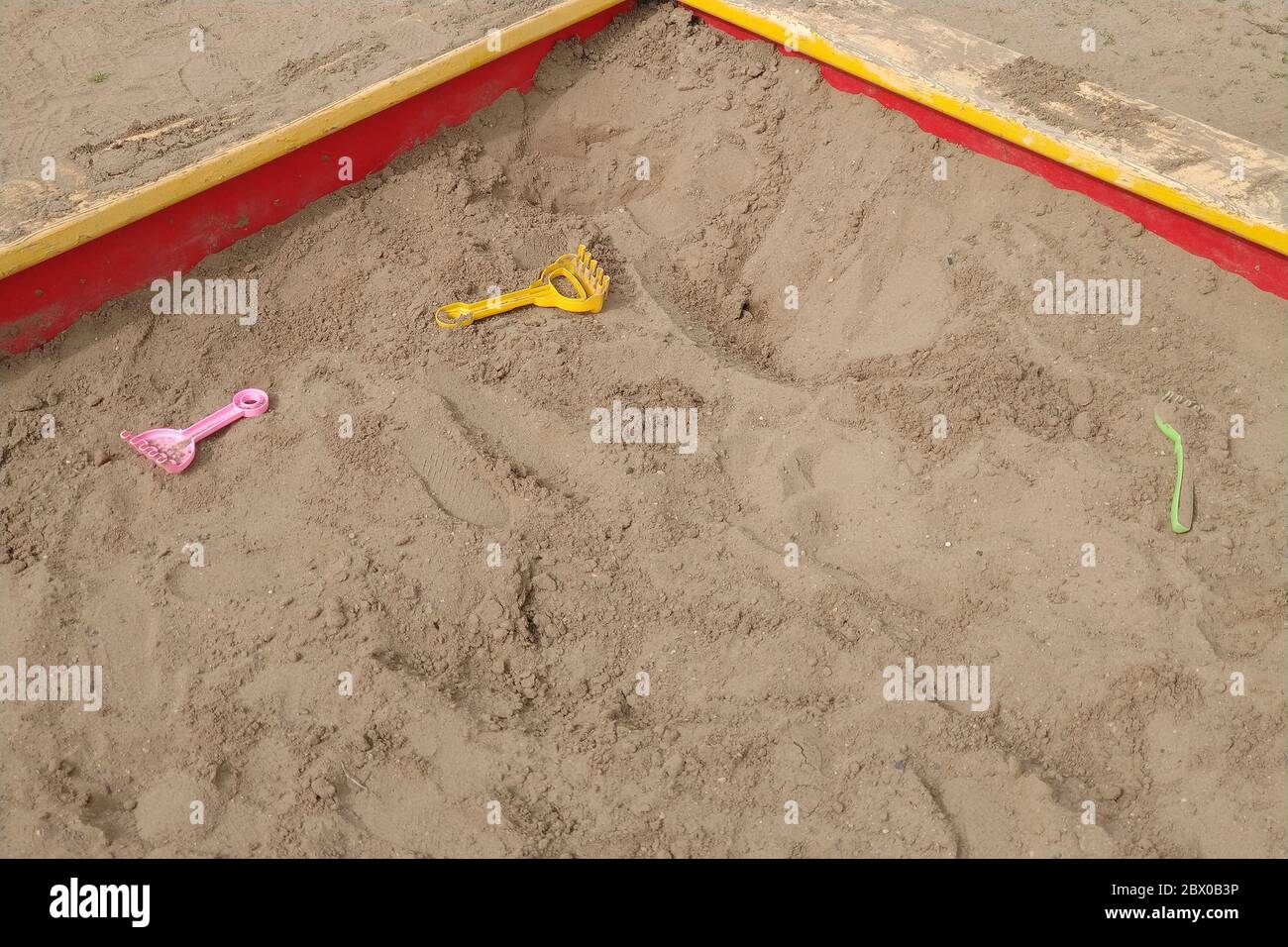 Kid's toys for playing in sand box playground, nobody Stock Photo - Alamy