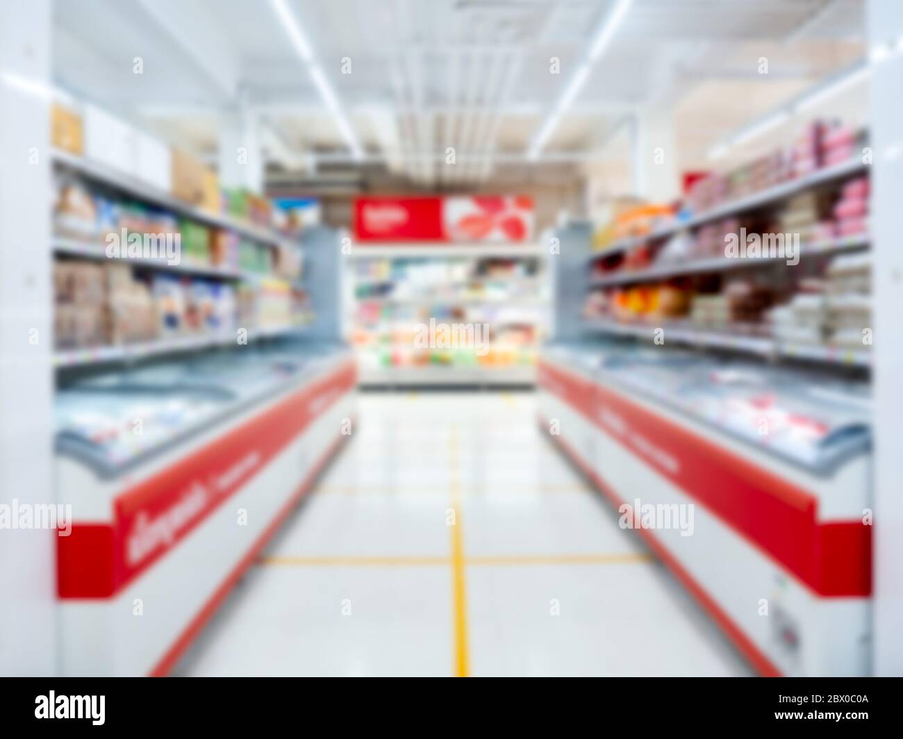Supermarket blur background. Blurred interior view with walkway between ...