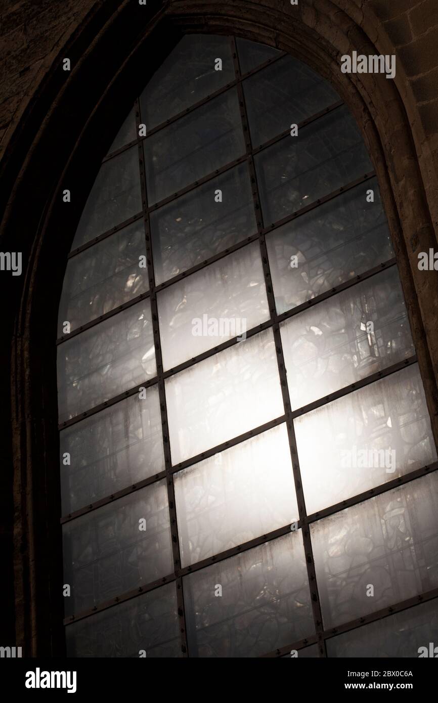 Color photograph of gothic church window light reflection. Captured in ...