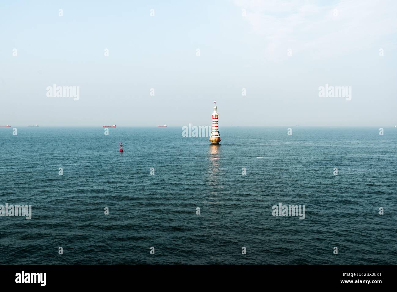isolated lighthouse at sea Stock Photo - Alamy