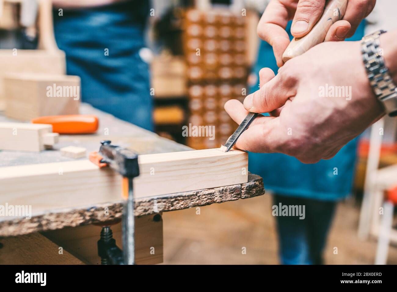 Senior woodworker with apprentice hi-res stock photography and images ...