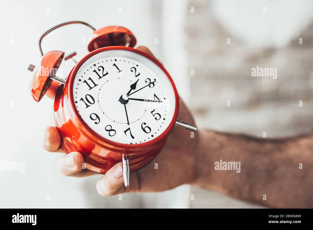 Adjusting the time hi-res stock photography and images - Alamy