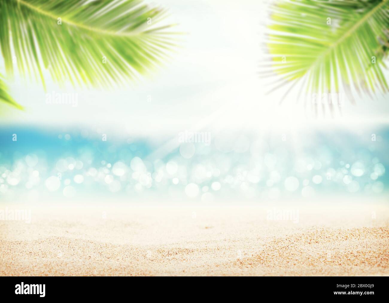 Summer tropical sea with sparkling waves, hot sand on the beach and ...