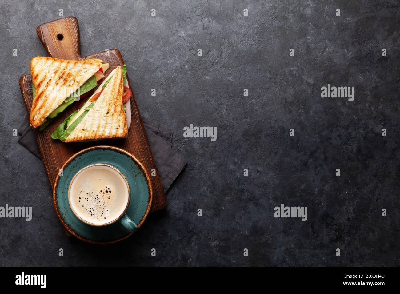 Club sandwich and coffee cup. Breakfast meal. Top view with copy space ...