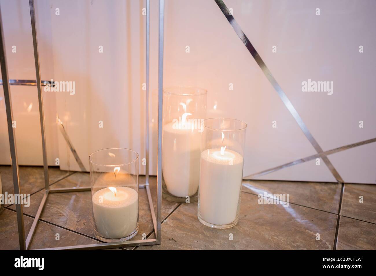candles on a table in restaurant with decor Stock Photo - Alamy