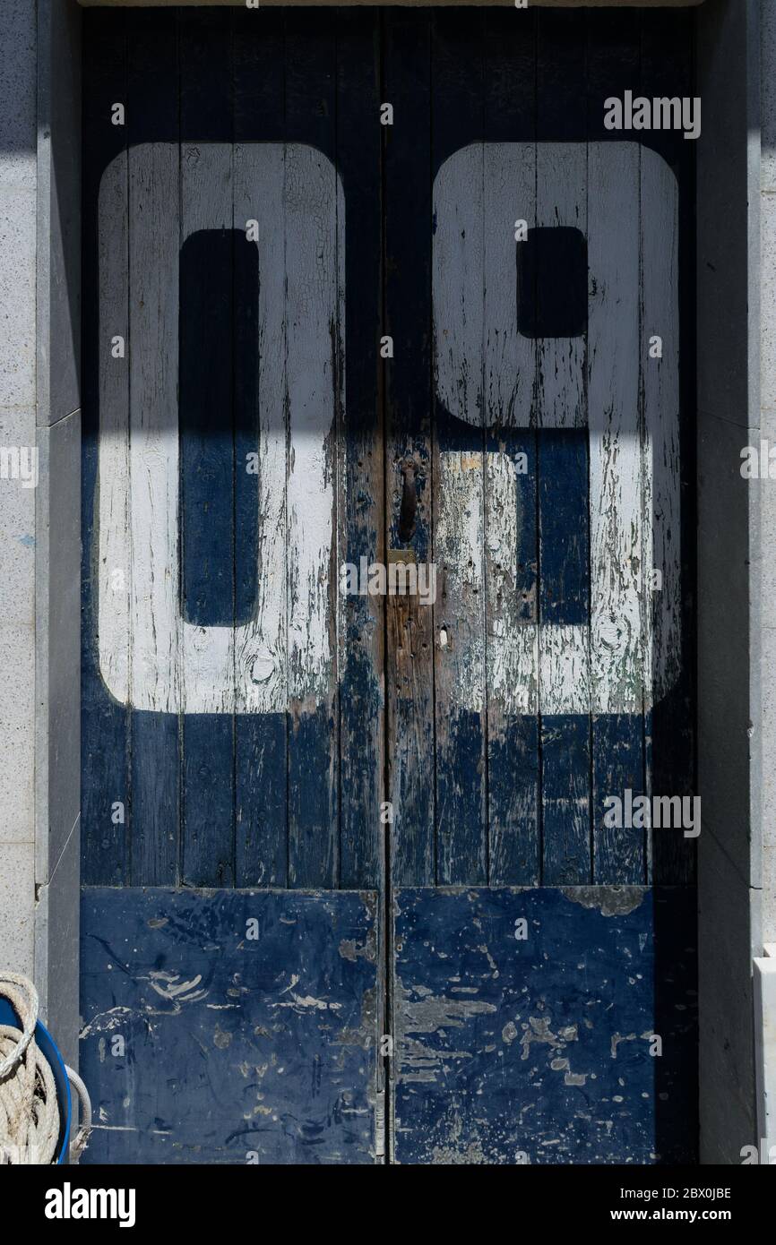 Number nine painted white on a wooden door Stock Photo - Alamy