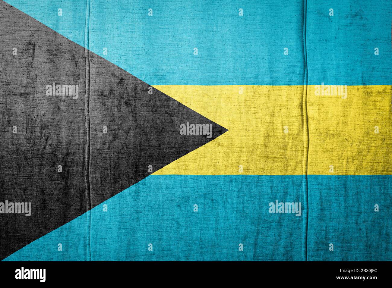 National flag of Bahamas depicting in paint colors on old clothl. Flag ...
