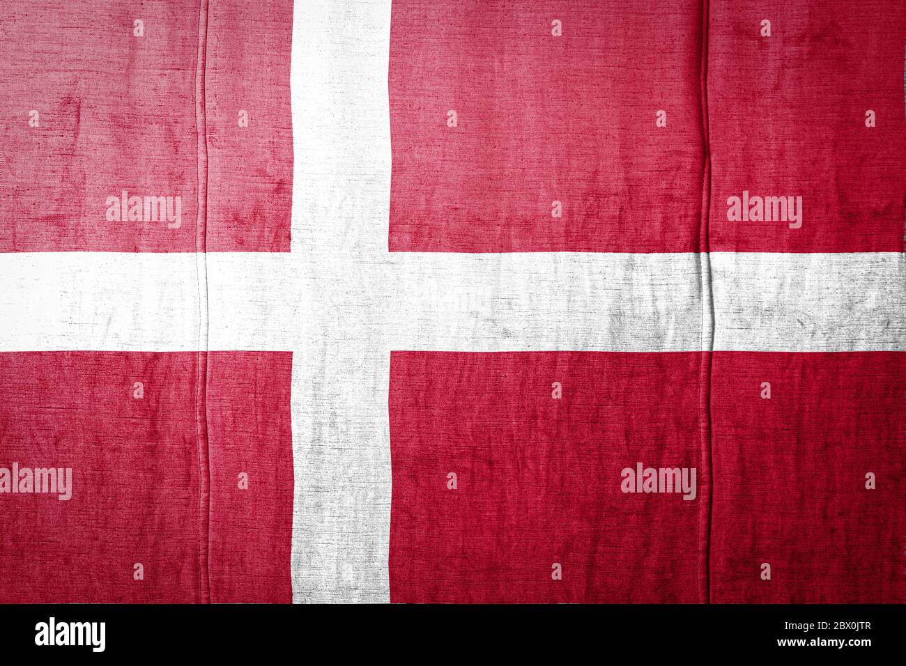 National flag of Denmark depicting in paint colors on old clothl. Flag ...