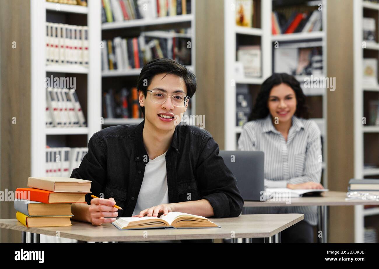 Boy girl taking notes hi-res stock photography and images - Alamy
