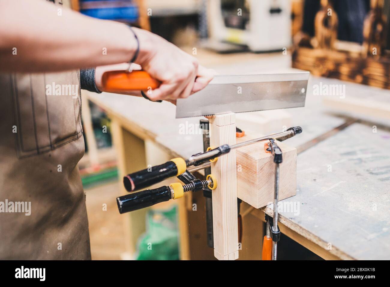 Manual processing of wood in the carpentry workshop - craft production ...