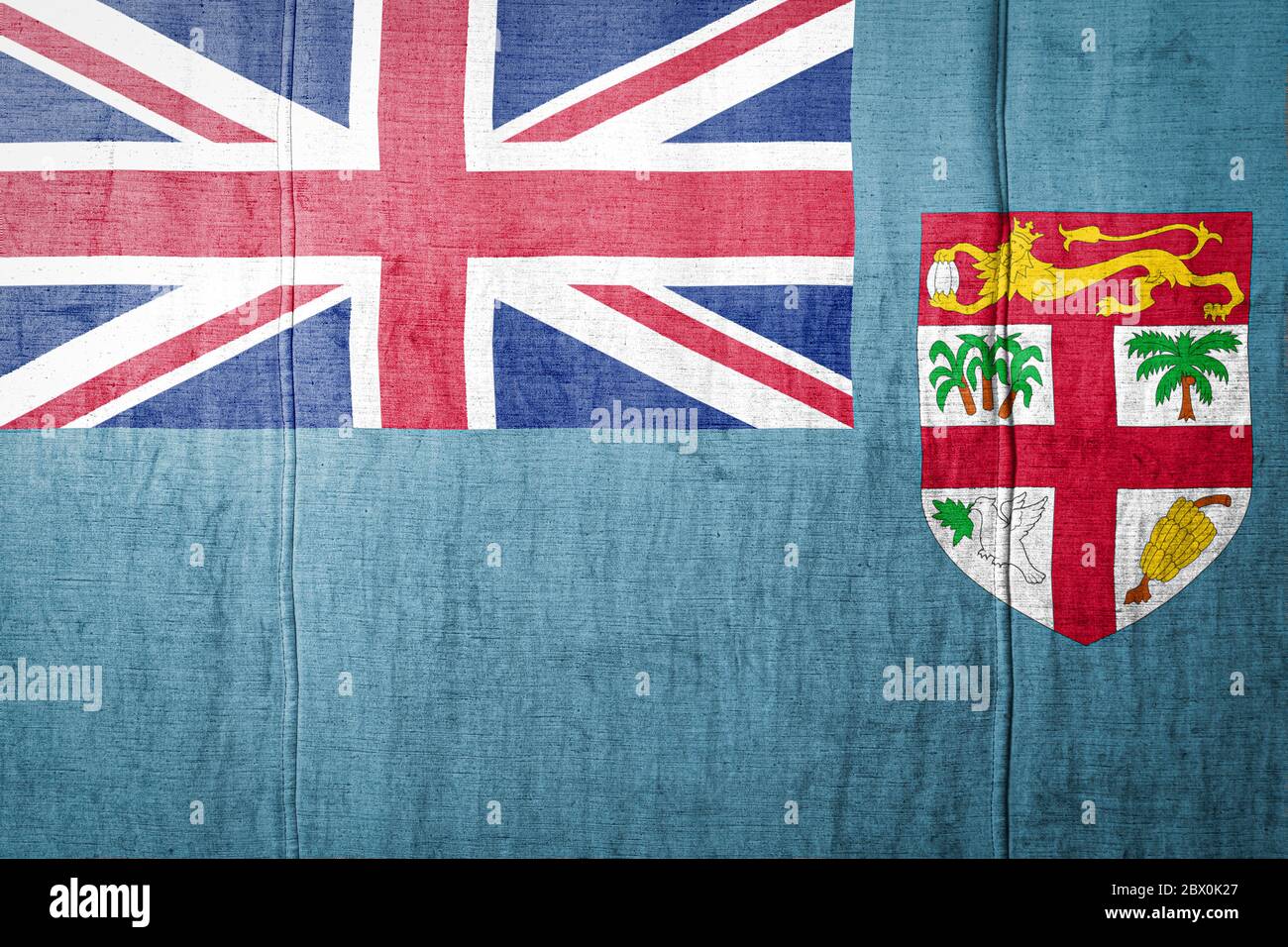 National flag of Fiji depicting in paint colors on old clothl. Flag ...