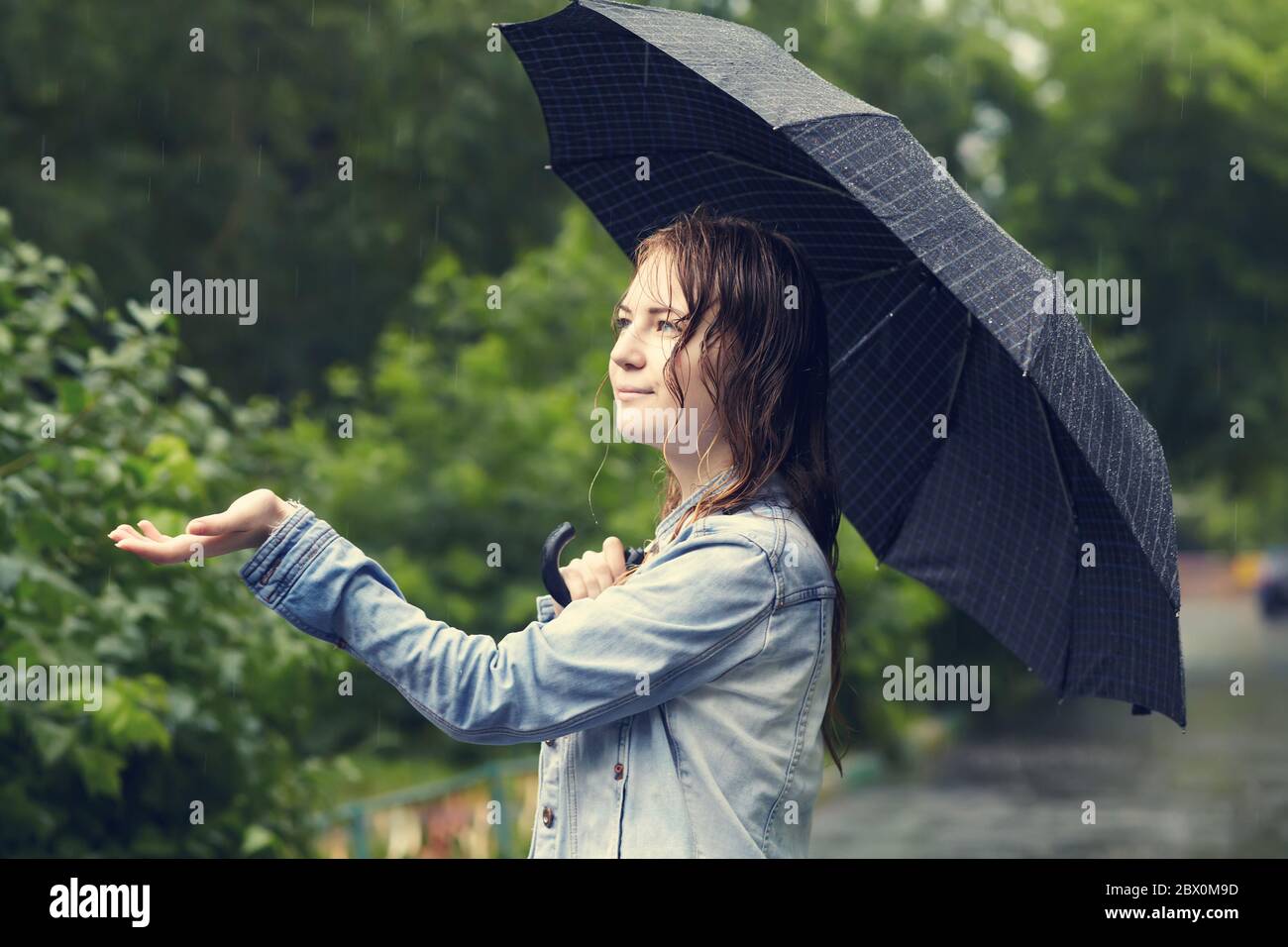Cheerful wet teen girl hi-res stock photography and images - Alamy