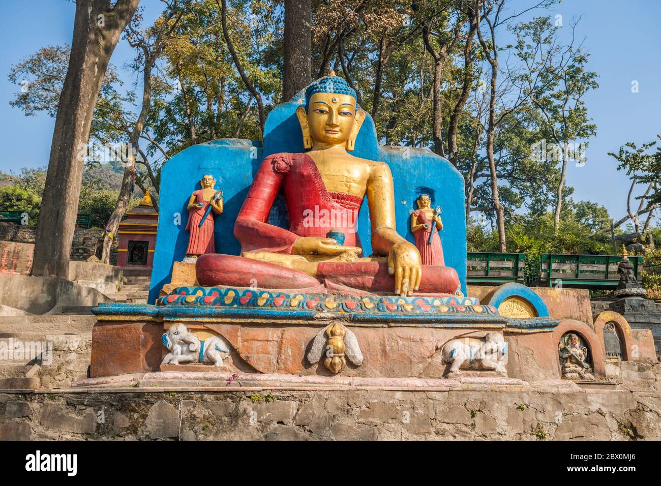 Golden Buddha statue at the entrance to Swayambhunath Stupa, Kathmandu ...