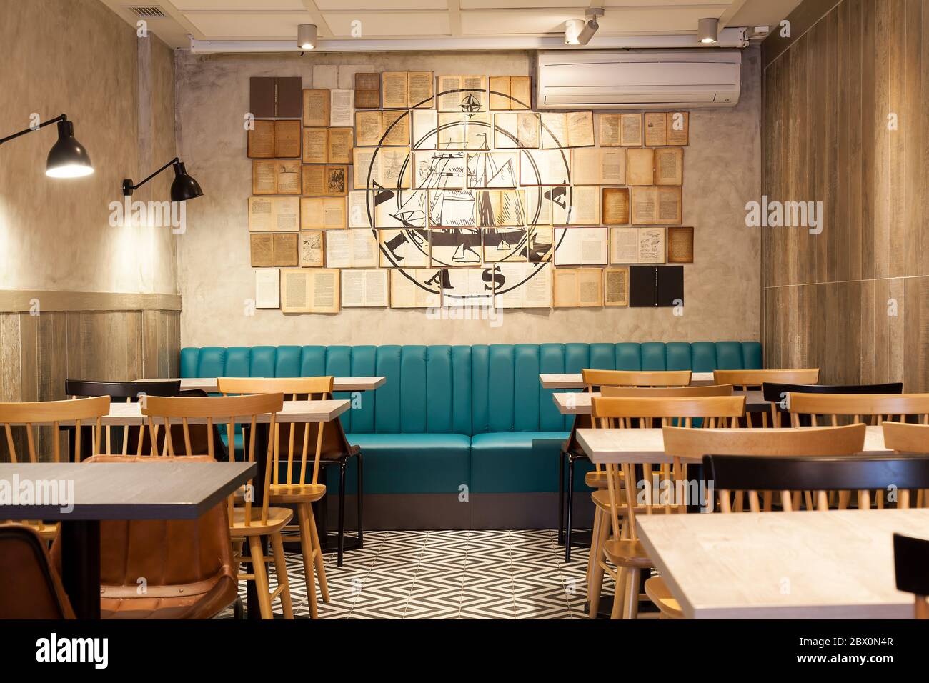 Elegant and modern restaurant with wooden walls and ceramic floors ...