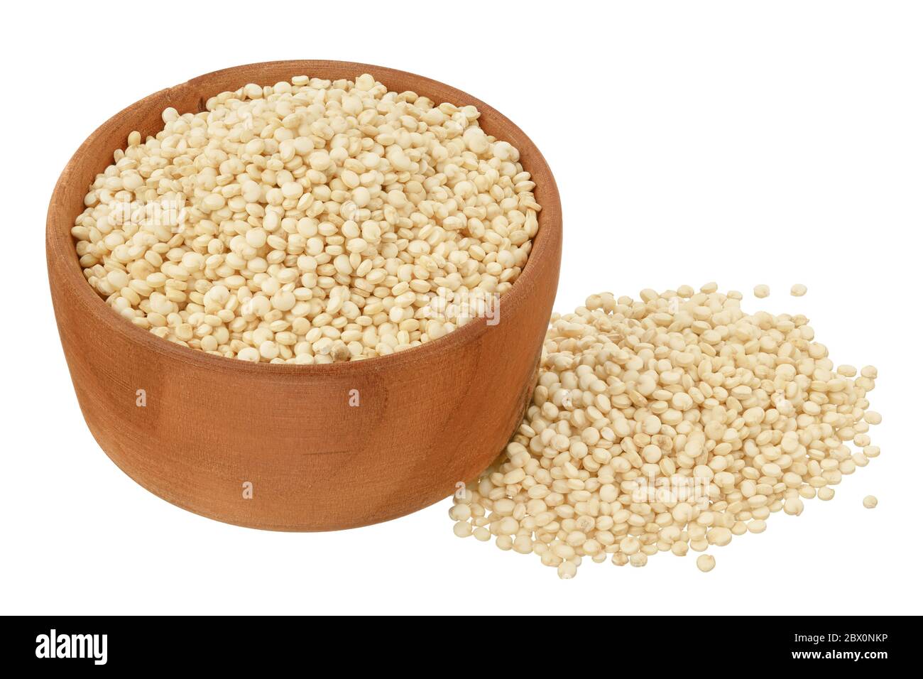 white quinoa seeds in wooden bowl isolated on white background with ...
