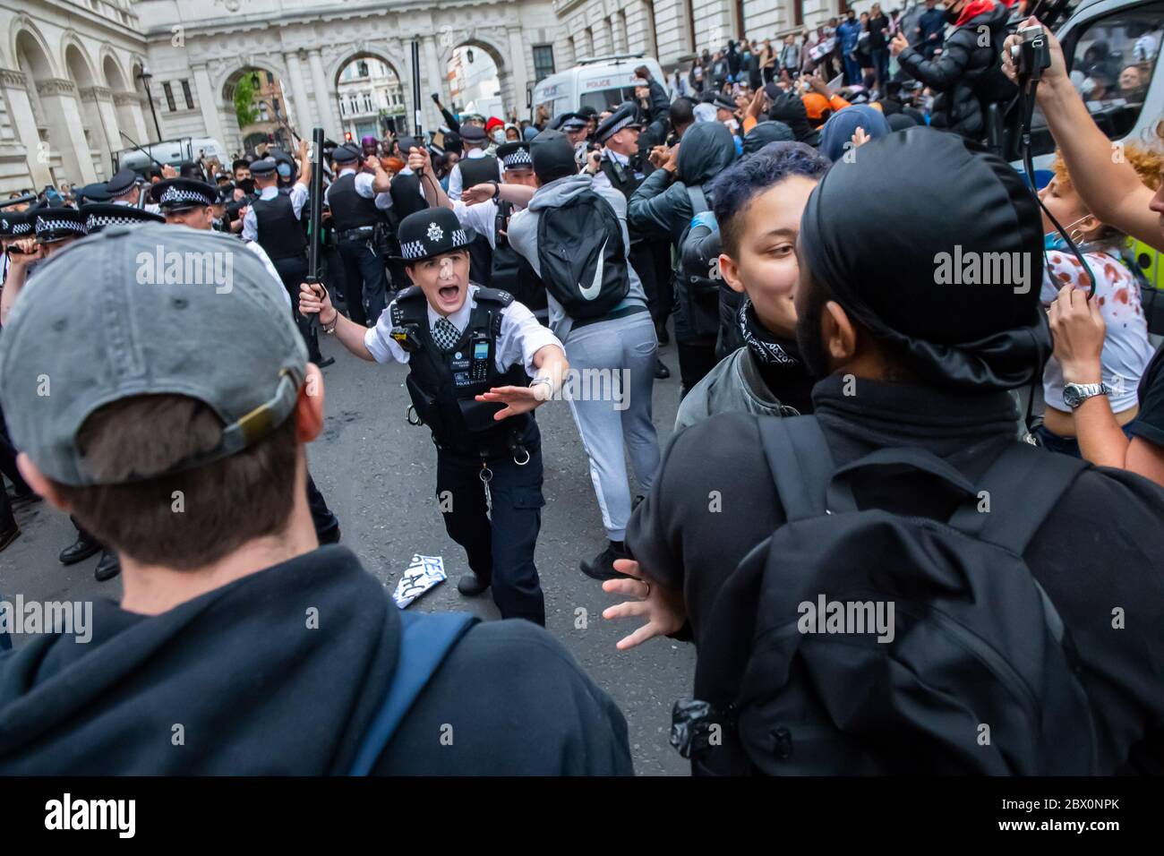 London, United Kingdom. 3rd June, 2020. Protesters and police face off ...
