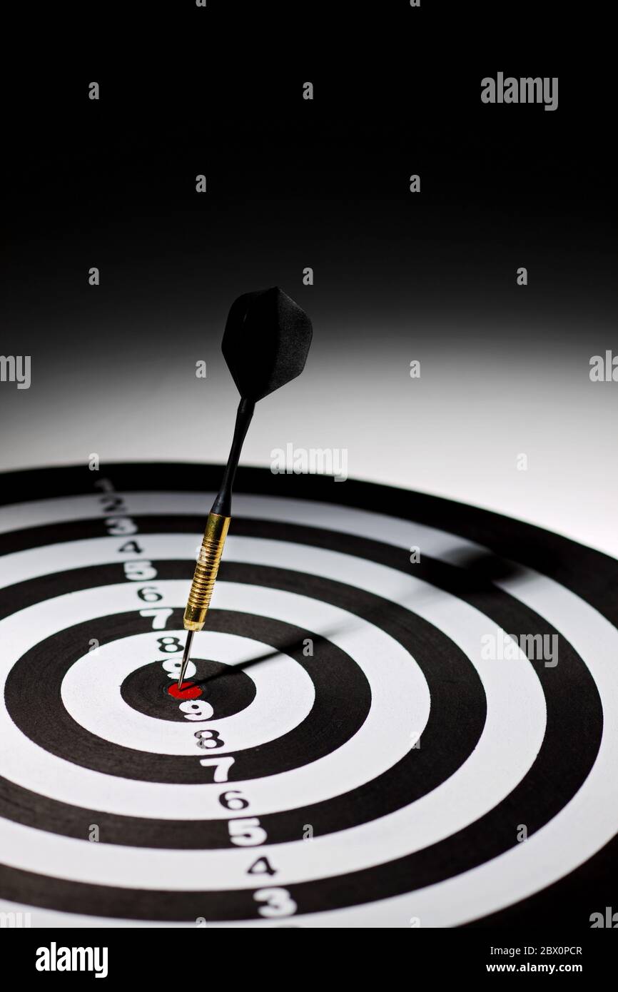 a hit dart in the middle at the target Stock Photo - Alamy