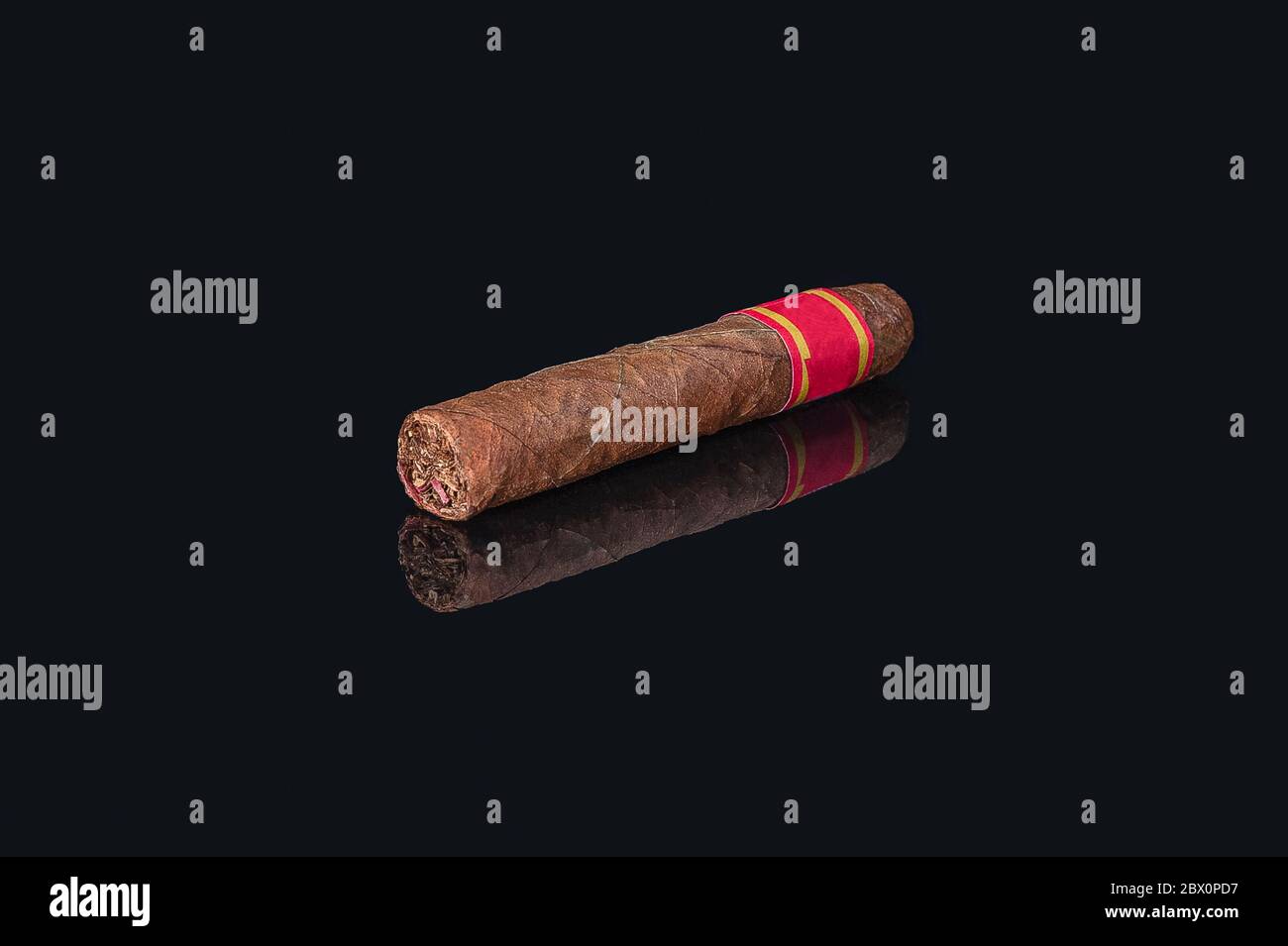 rolled bundle cuban cigar on isolated black background with reflection ...