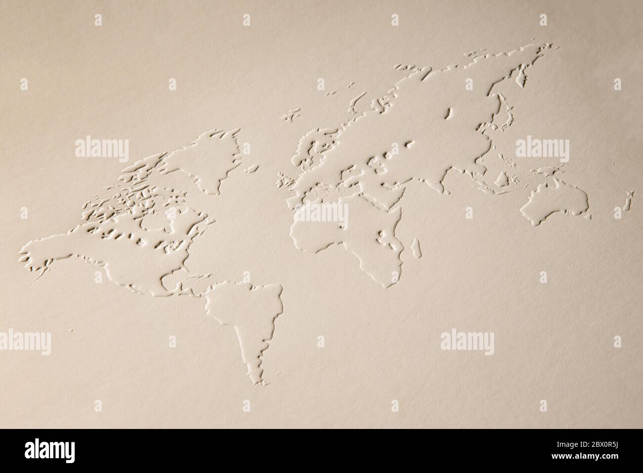 a world map made of embossing paper Stock Photo - Alamy