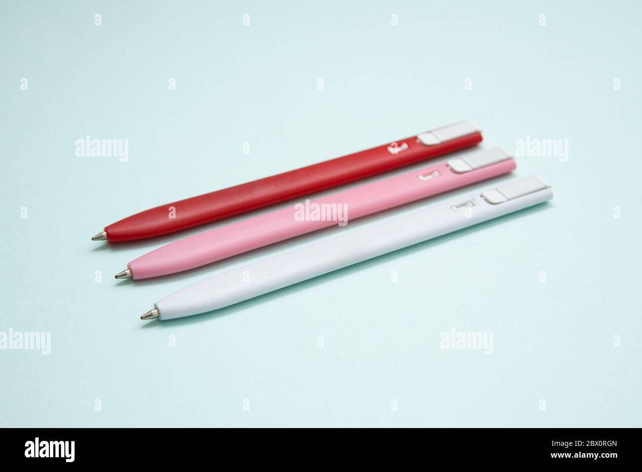 Mini ballpoint pen with little cute pink tone Stock Photo - Alamy
