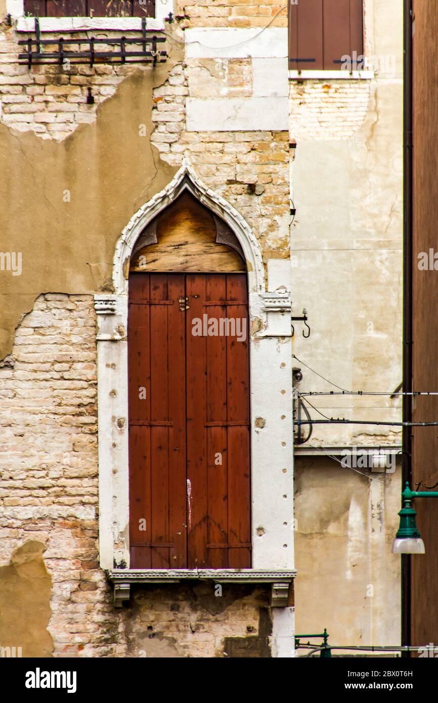 Old traditional widow on building in Venice, Italy Stock Photo - Alamy