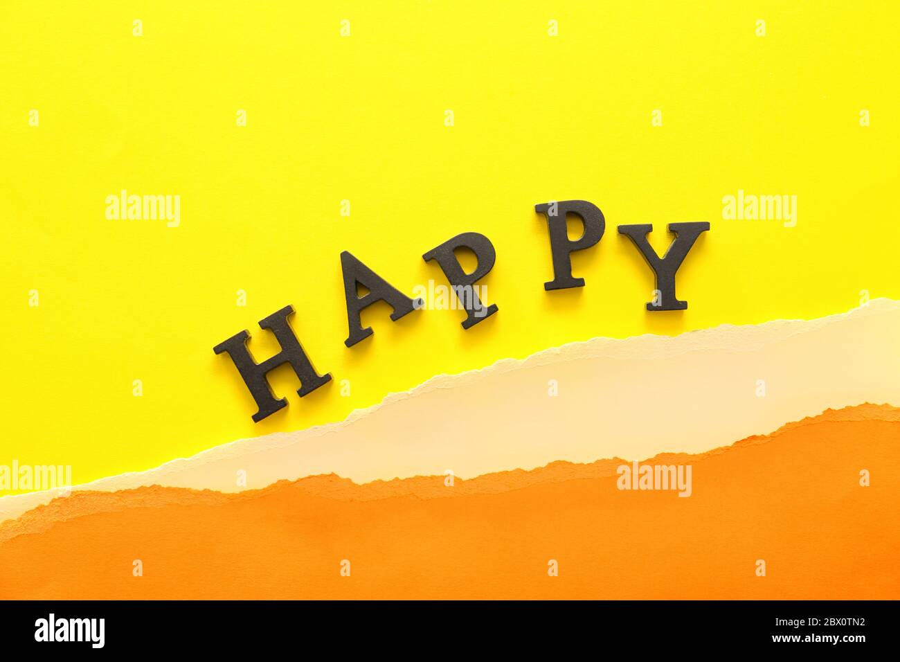 Word HAPPY on color background Stock Photo - Alamy
